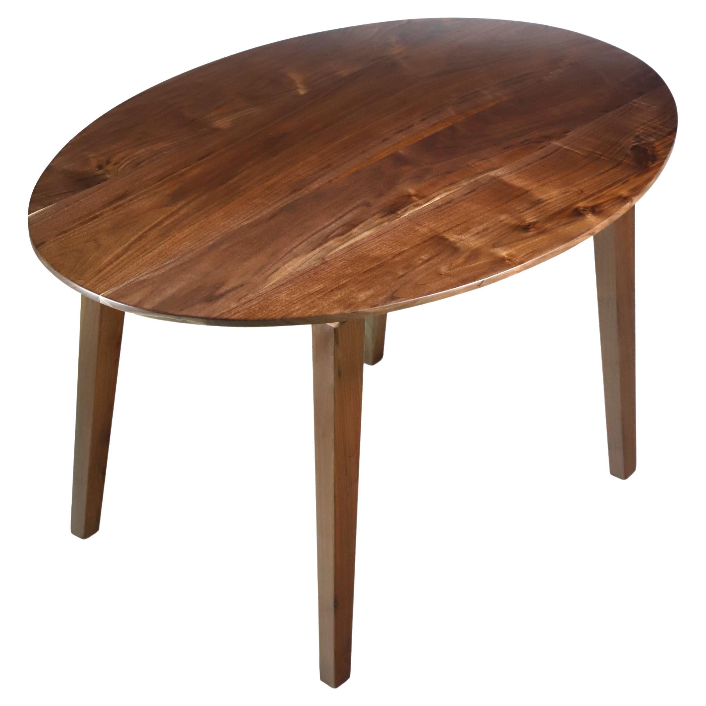 4.5 ft Oval Tapered Leg Solid Walnut Dining Table For Sale at 1stDibs