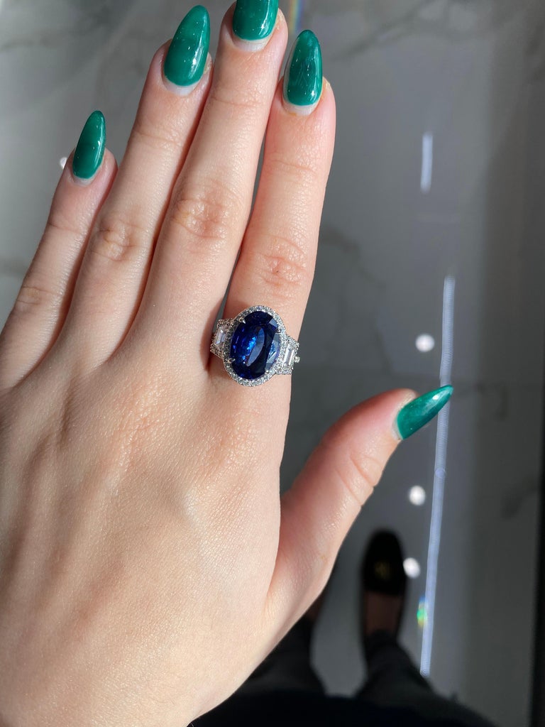 5.04ct Oval Sapphire with 0.68ctw Step Cut Trapezoid and 0.50ct Diamond ...