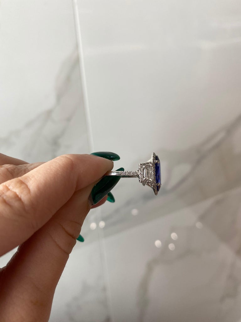 5.04ct Oval Sapphire with 0.68ctw Step Cut Trapezoid and 0.50ct Diamond ...