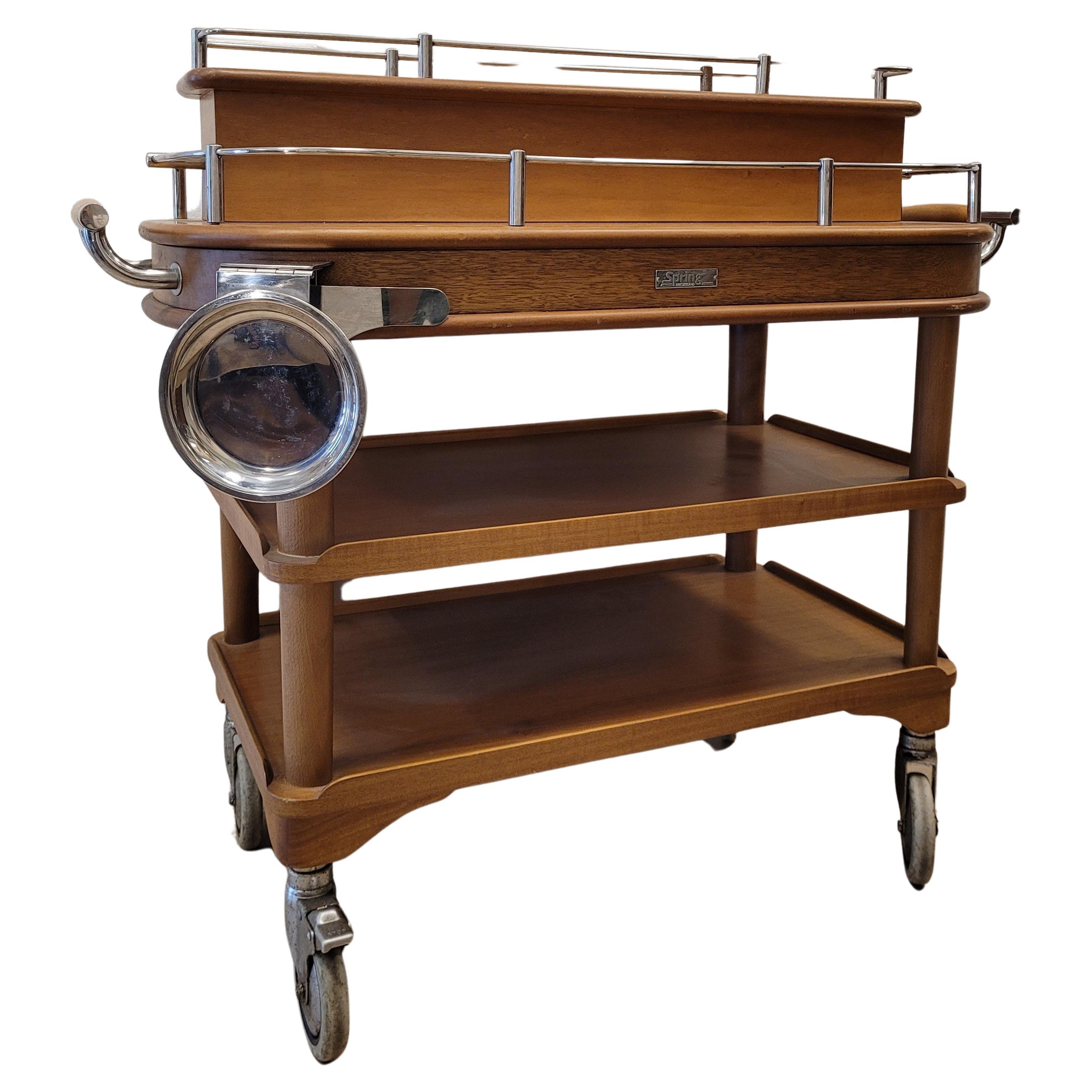 50s Spring Switzerland wood Drybar Barcart , wheels For Sale at 1stDibs