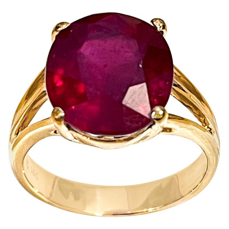 6.5 Carat Oval Shape Treated Ruby 14 Karat Yellow Gold Ring at 1stDibs