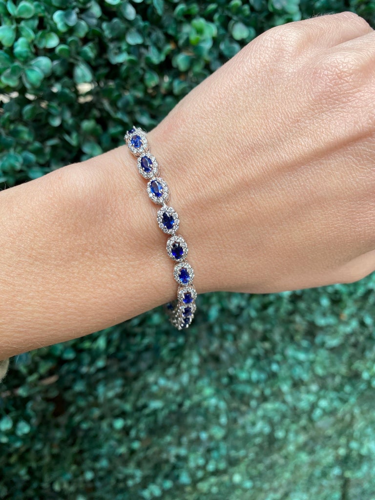 6.67 Carat Total Weight Natural Blue Oval Cut Sapphire and Diamond Halo ...