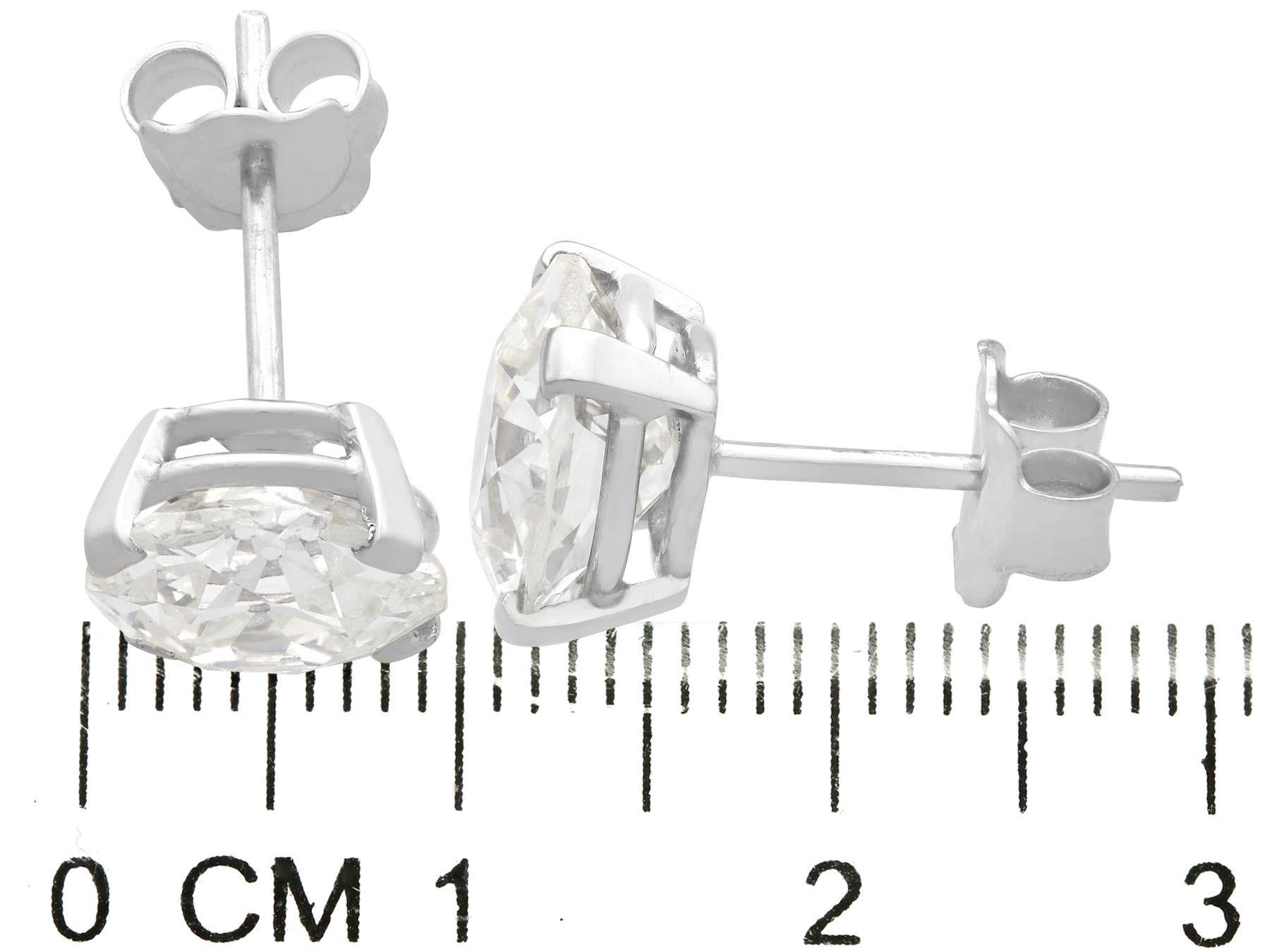 6.69 Carat Diamond and Platinum Stud Earrings at 1stDibs