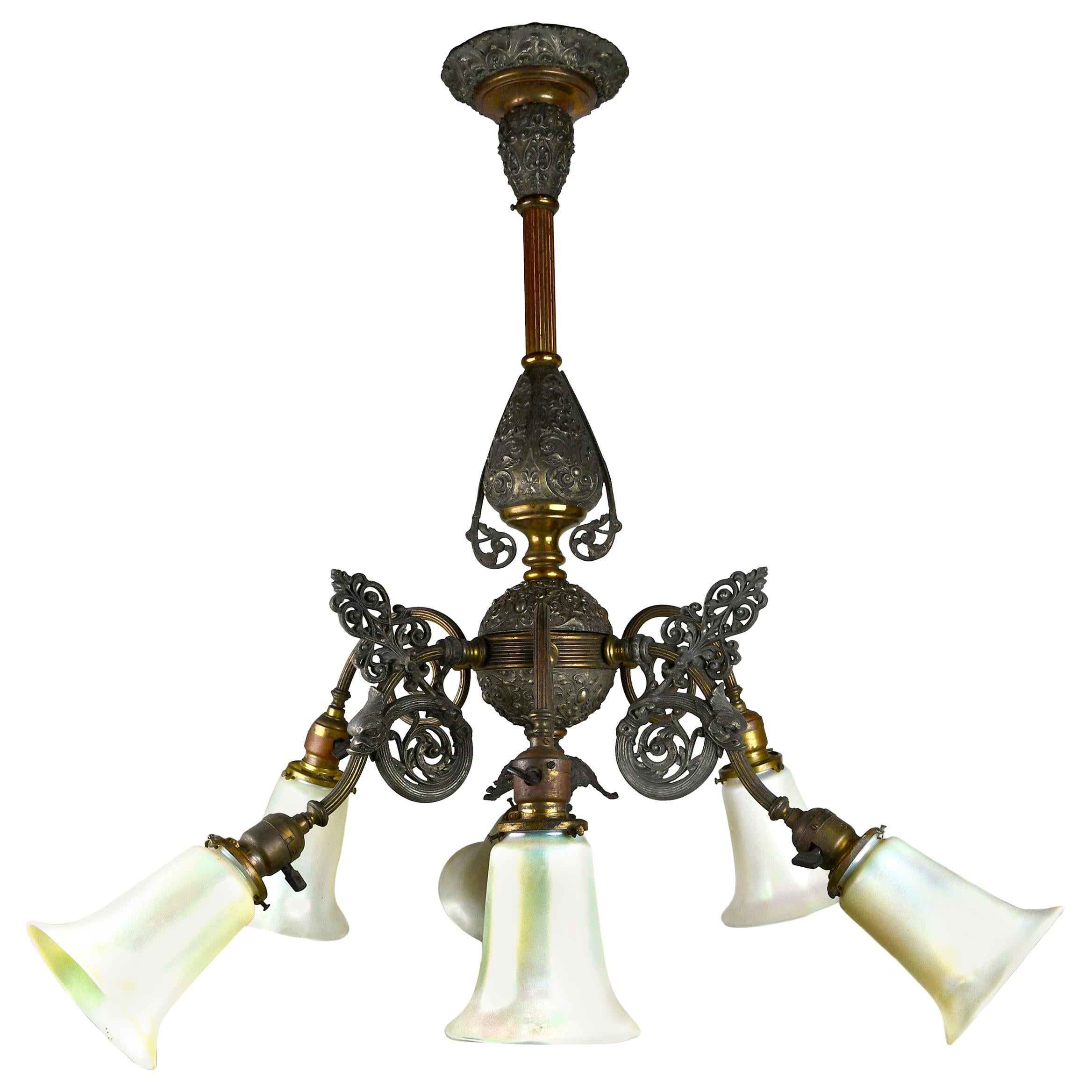 7-Light Chandelier with Quezal Shades and Gargoyle Design at 1stDibs
