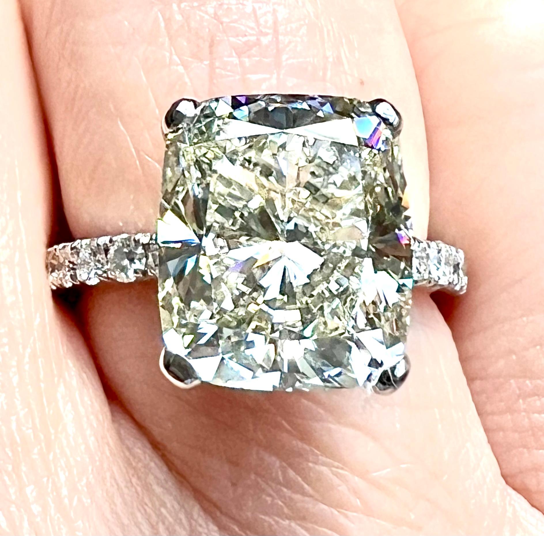 7.02 carat certified diamond Engagement Ring surrounded by a diamond ...
