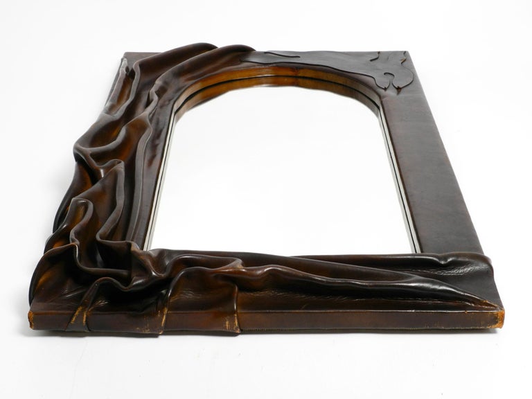 70s large wooden wall mirror with an elaborate and thick flowing ...