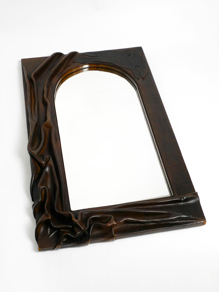 70s large wooden wall mirror with an elaborate and thick flowing ...
