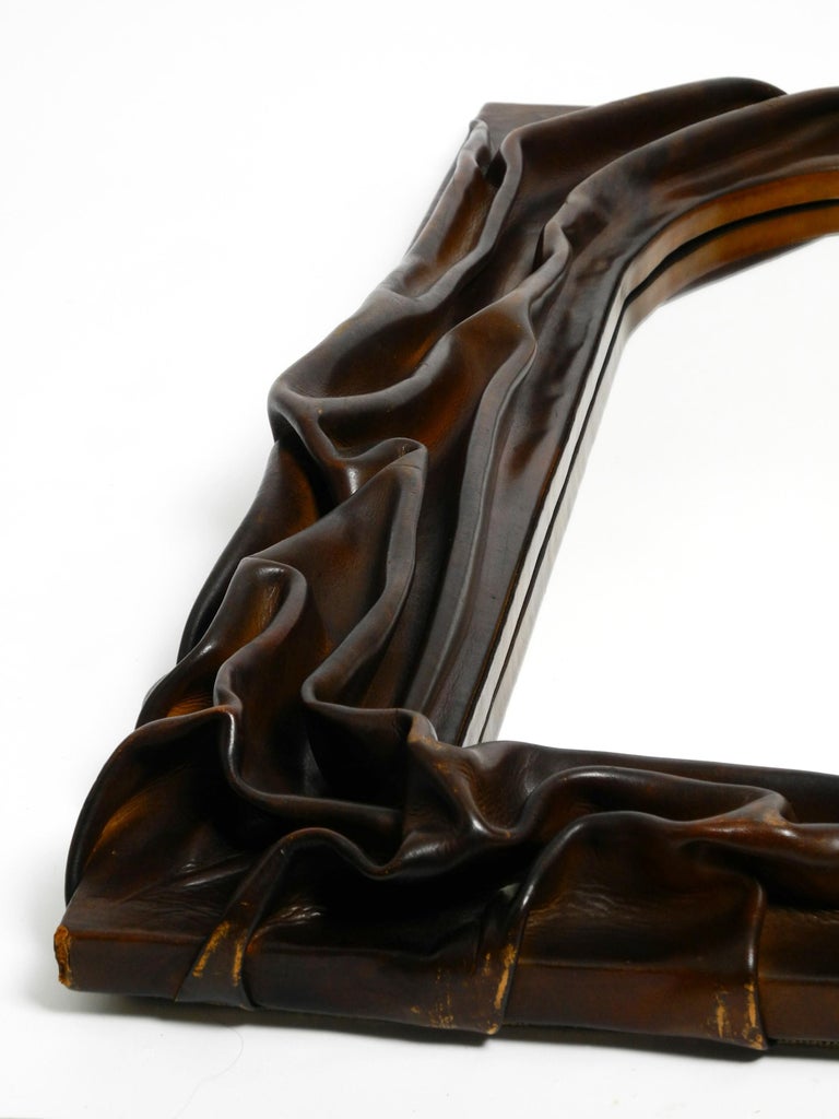 70s large wooden wall mirror with an elaborate and thick flowing ...