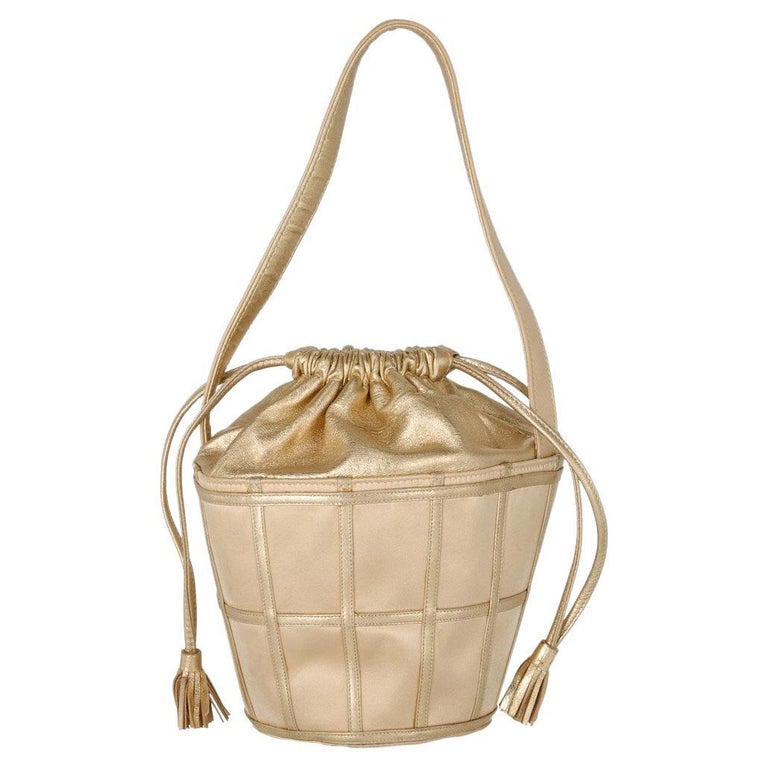 70s René Caovilla Vintage gold-tone leather bucket bag with silk satin ...