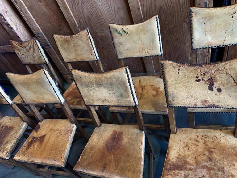 8 Distressed Leather Chairs with Studs For Sale at 1stDibs