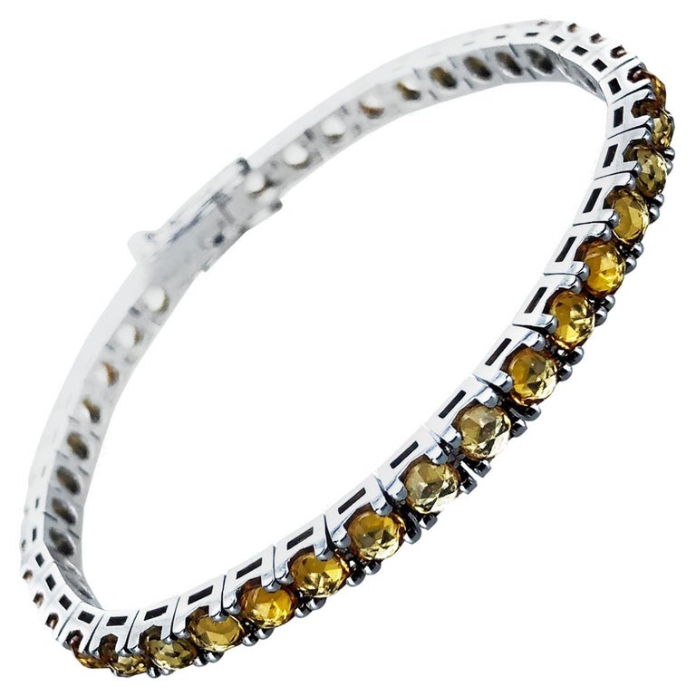 8 37 Carat Light Orange Sapphire Set In 18kt White Gold Unisex Tennis