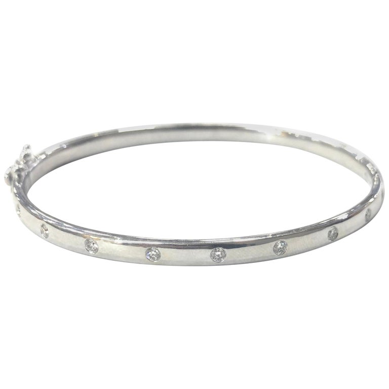 9 Carat White Gold Solid Hinged Diamond Bangle For Sale at 1stDibs