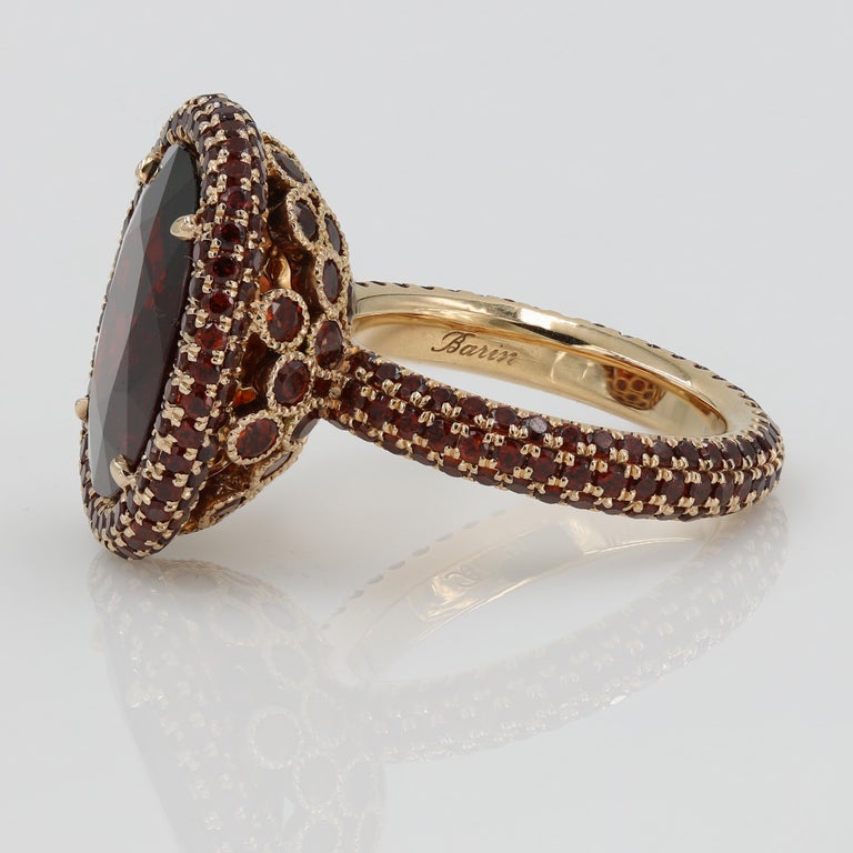 9.13 Carat Oval Cut Garnet with Small Round Cut Garnets in 18 Karat ...