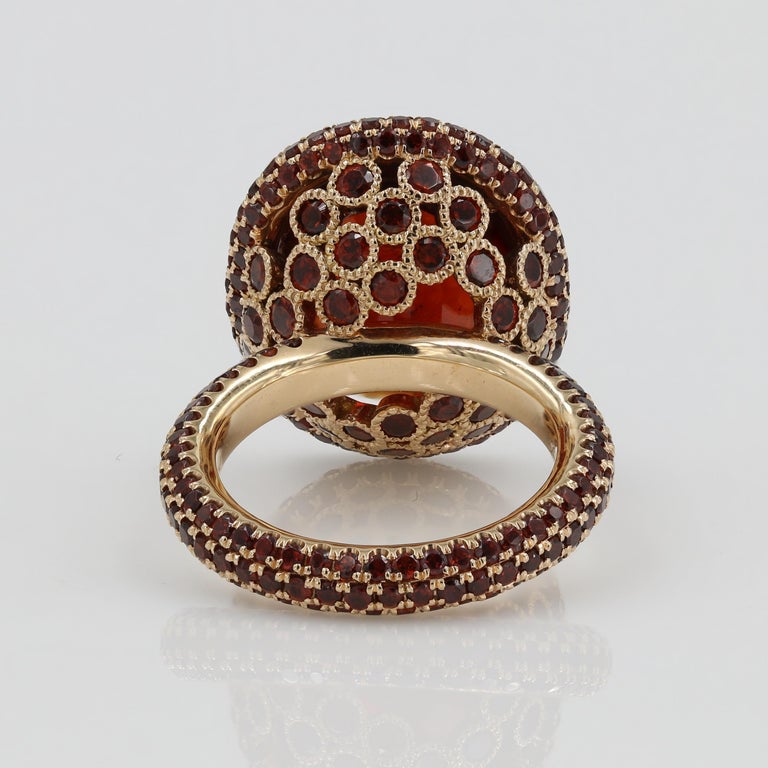 9.13 Carat Oval Cut Garnet with Small Round Cut Garnets in 18 Karat ...