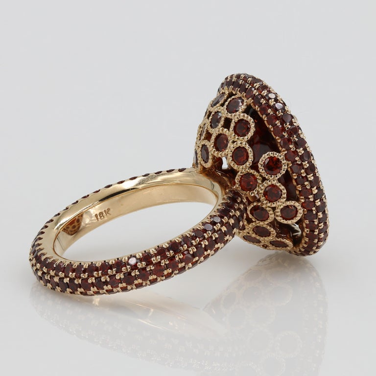 9.13 Carat Oval Cut Garnet with Small Round Cut Garnets in 18 Karat ...