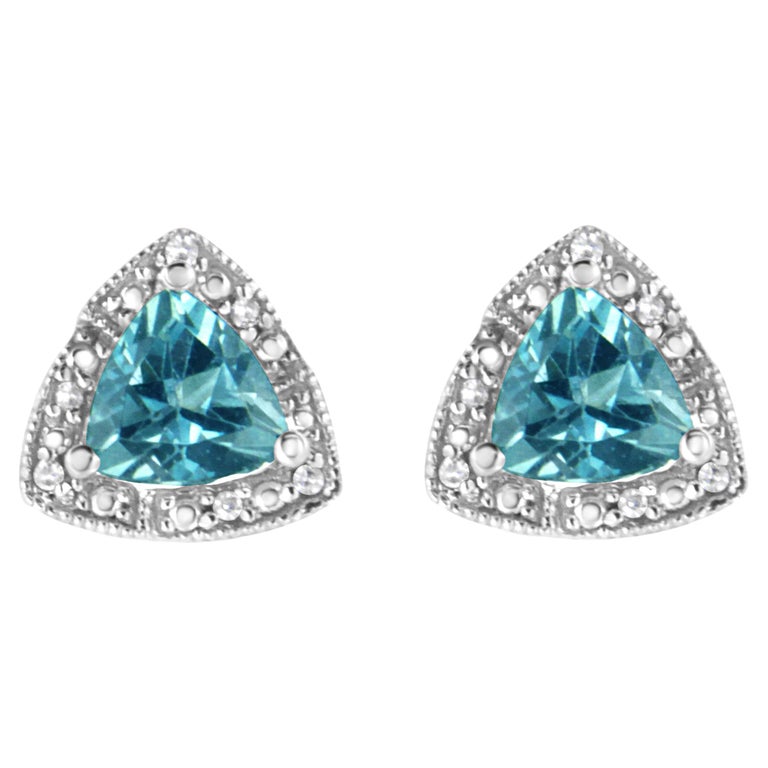 .925 Sterling Silver Blue Topaz Gemstone and Diamond Accent Stud ...