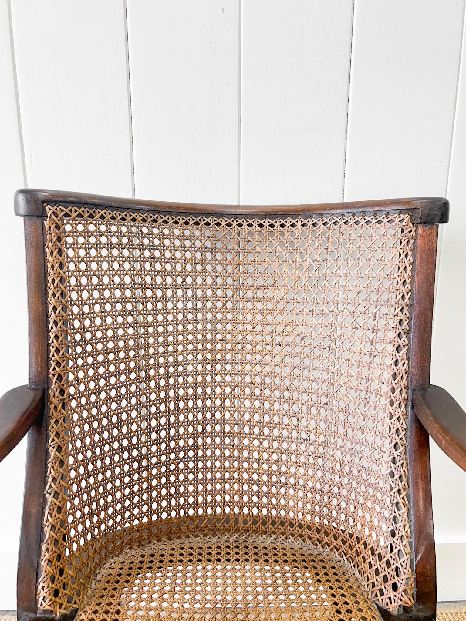 A 19th Century Mahogany Anglo-Indian Caned Arm Chair For Sale at 1stDibs