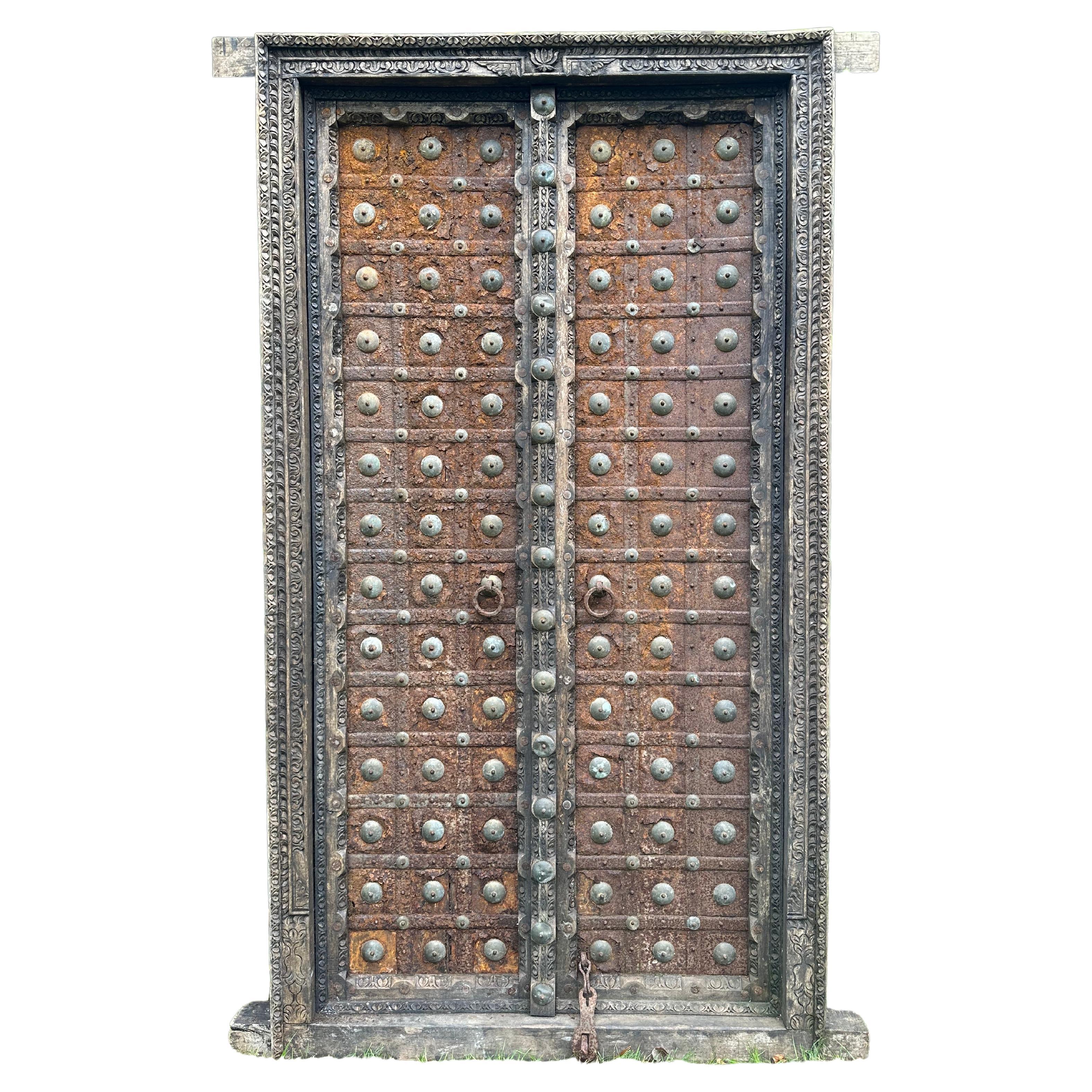 A 19th century pair of rustic Indian doors. For Sale at 1stDibs