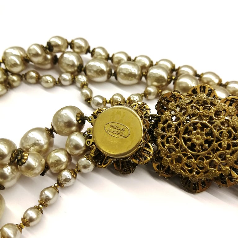 A baroque pearl and iridescent paste three row necklace, Miriam Haskell ...