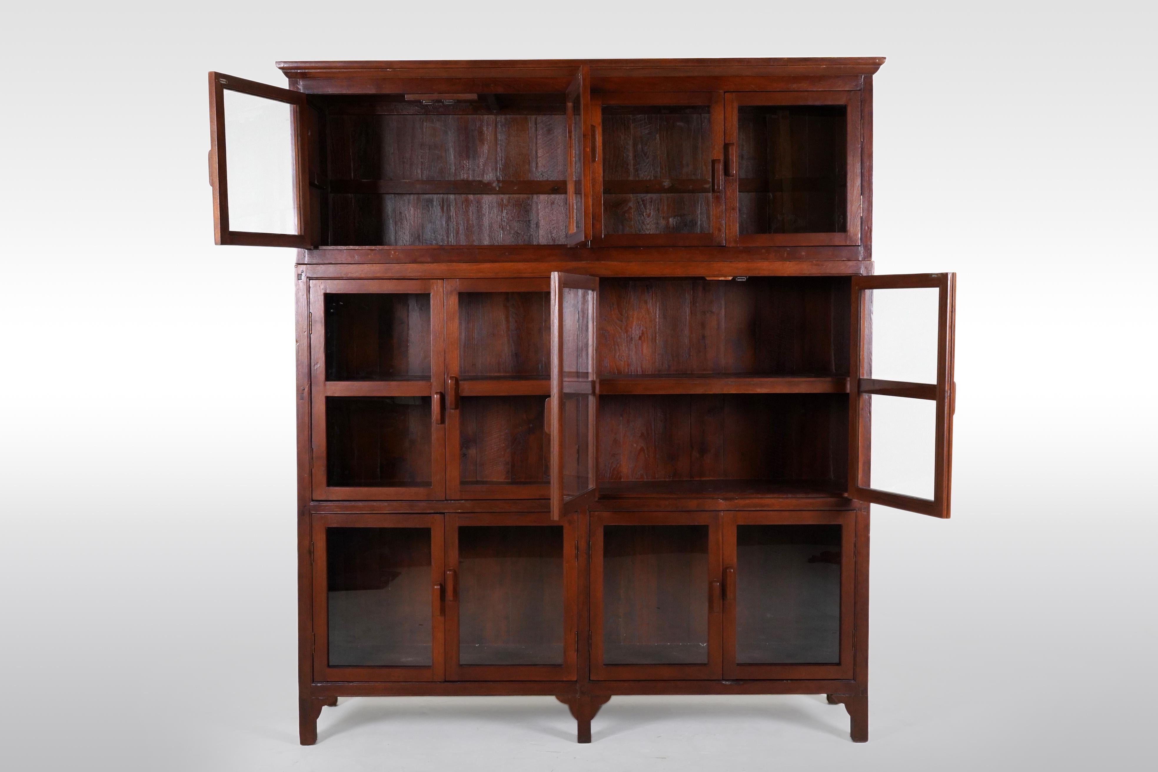 A British Colonial Teak Wood Bookcase For Sale at 1stDibs