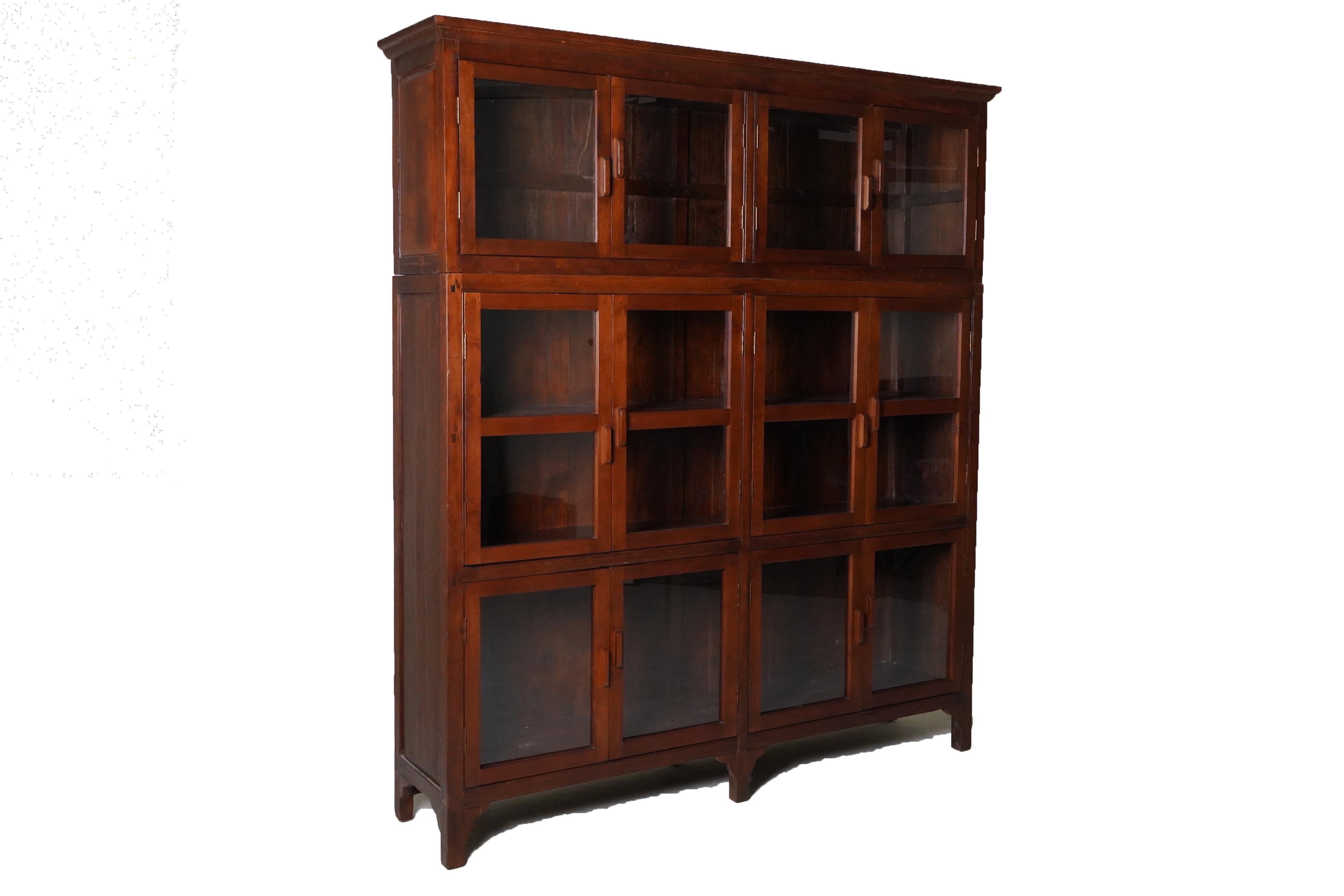 A British Colonial Teak Wood Bookcase For Sale at 1stDibs