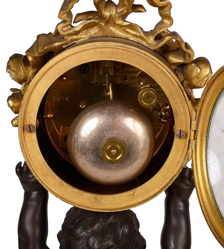 A classical French bronze and ormolu striking mantel clock For Sale at ...