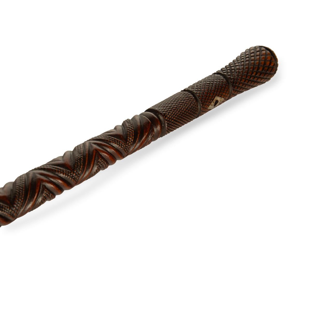 A cleverly carved mahogany walking cane For Sale at 1stDibs