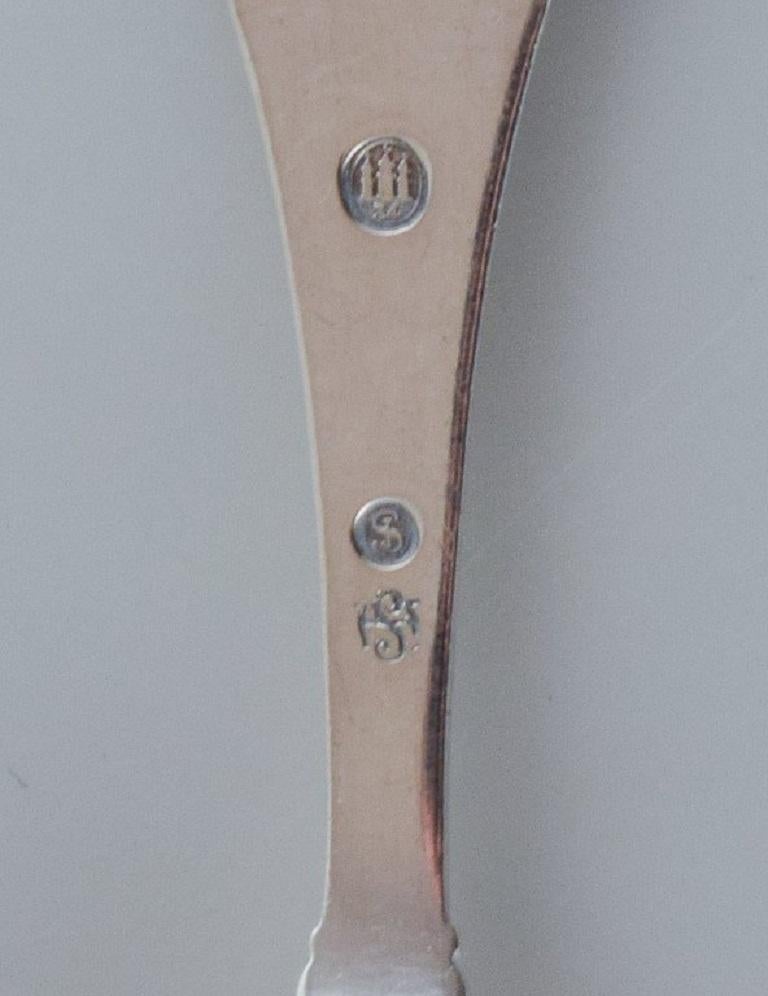 A collection of three silver spoons. For Sale at 1stDibs