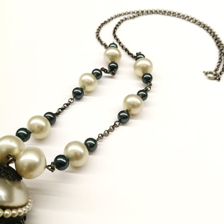 A cream, grey faux pearl and chain 'tassel' sautoir, att. Rousselet ...
