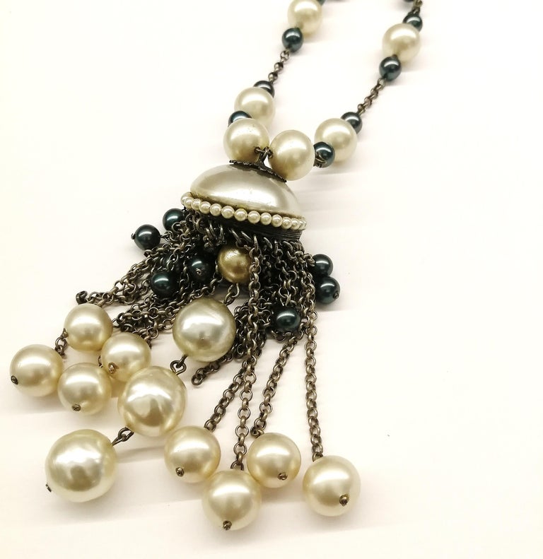 A cream, grey faux pearl and chain 'tassel' sautoir, att. Rousselet ...