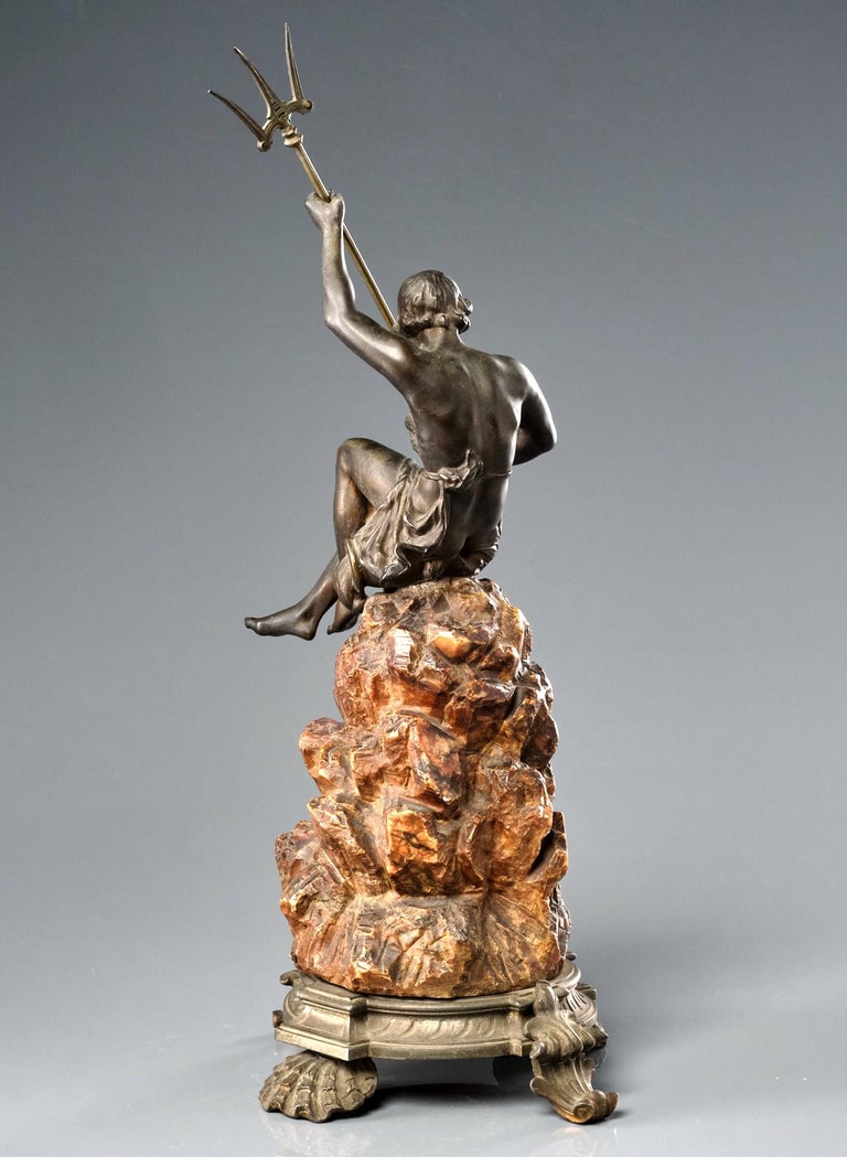A Finely Cast Spelter Figure of Neptune Mounted Atop a Carved Soapstone ...