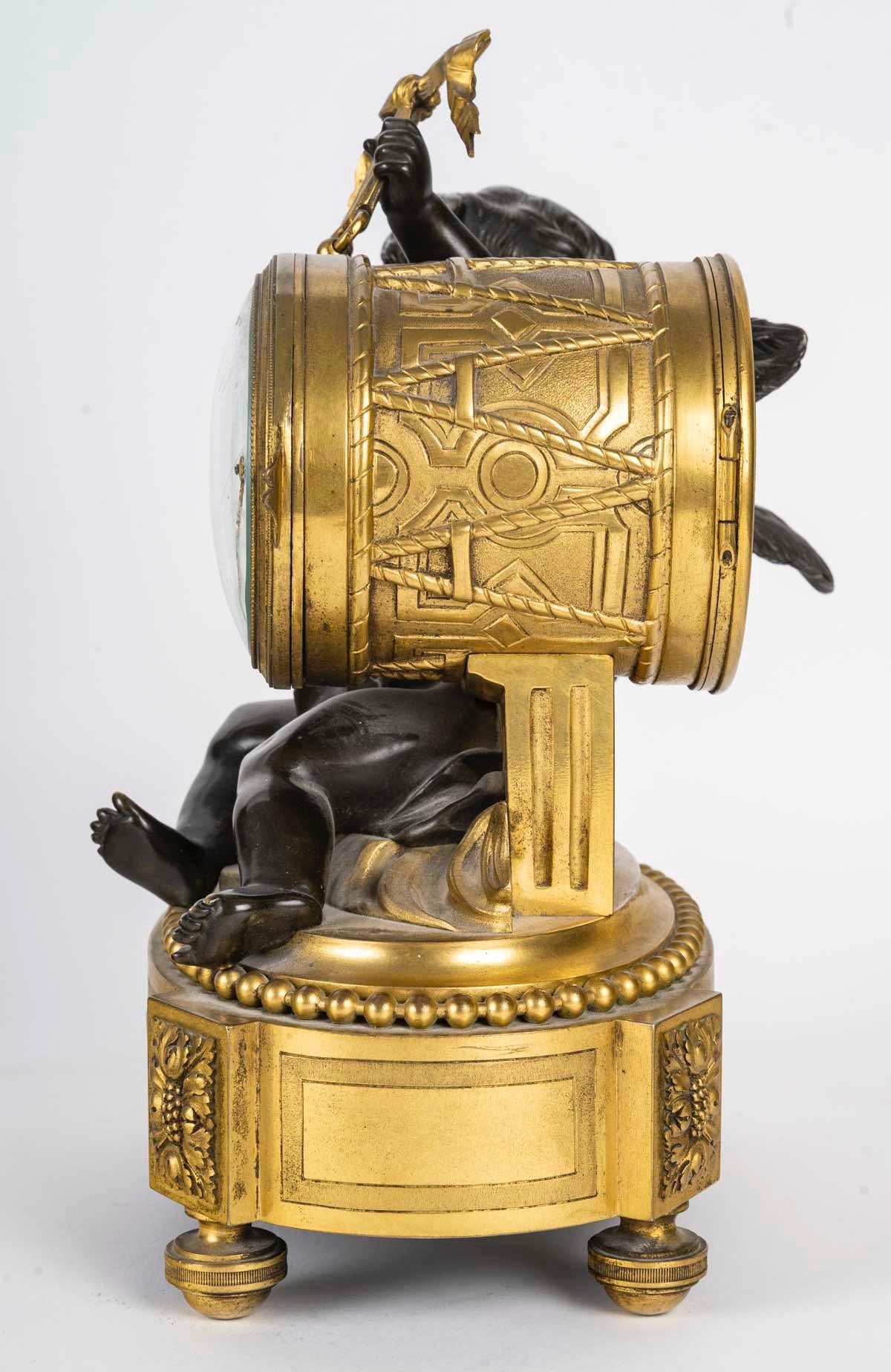A French 19th Century Mantel Clock “cupid with a drum” For Sale at 1stDibs