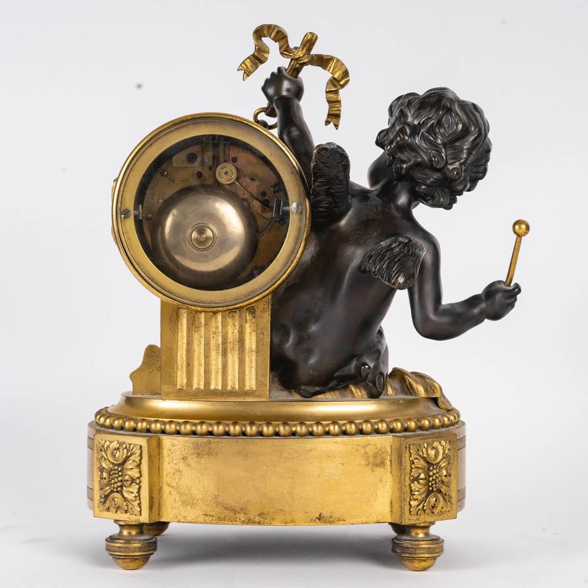 A French 19th Century Mantel Clock “cupid with a drum” For Sale at 1stDibs