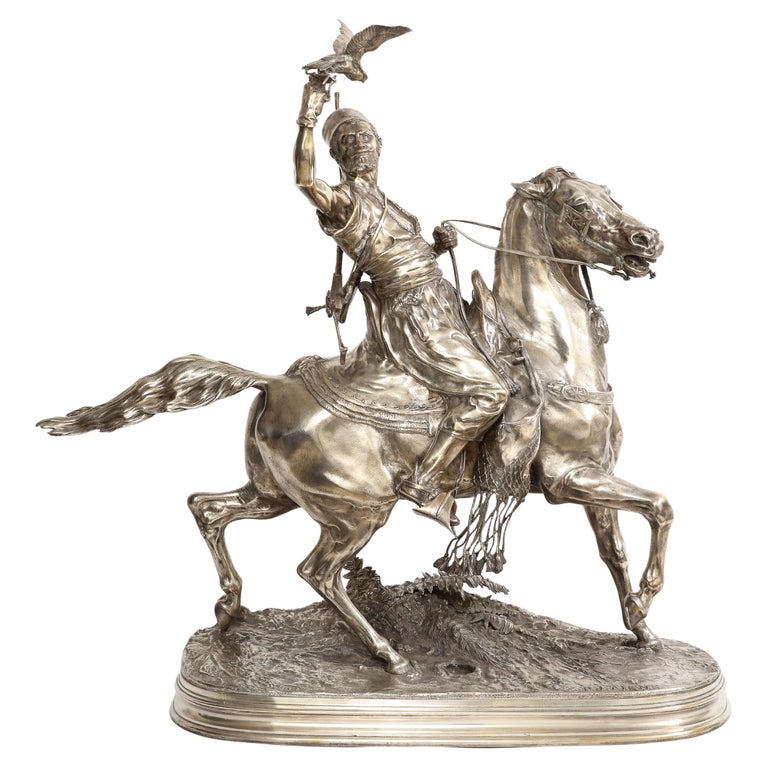 A French Orientalist Silvered Bronze Group of "The Falconer", P.J. Mene ...