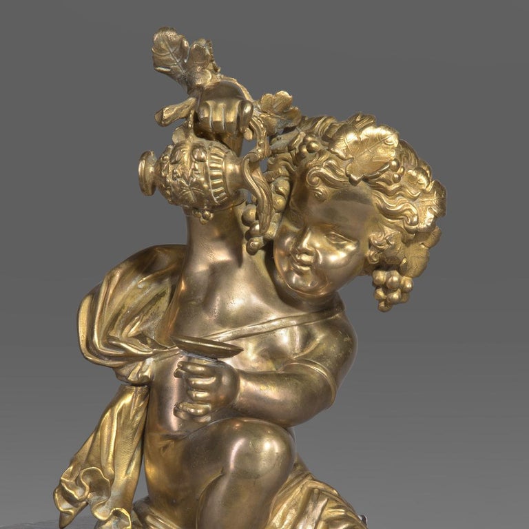 Gilt Bronze Bacchanalian Putto Figure on a Rouge Marble Plinth, circa ...
