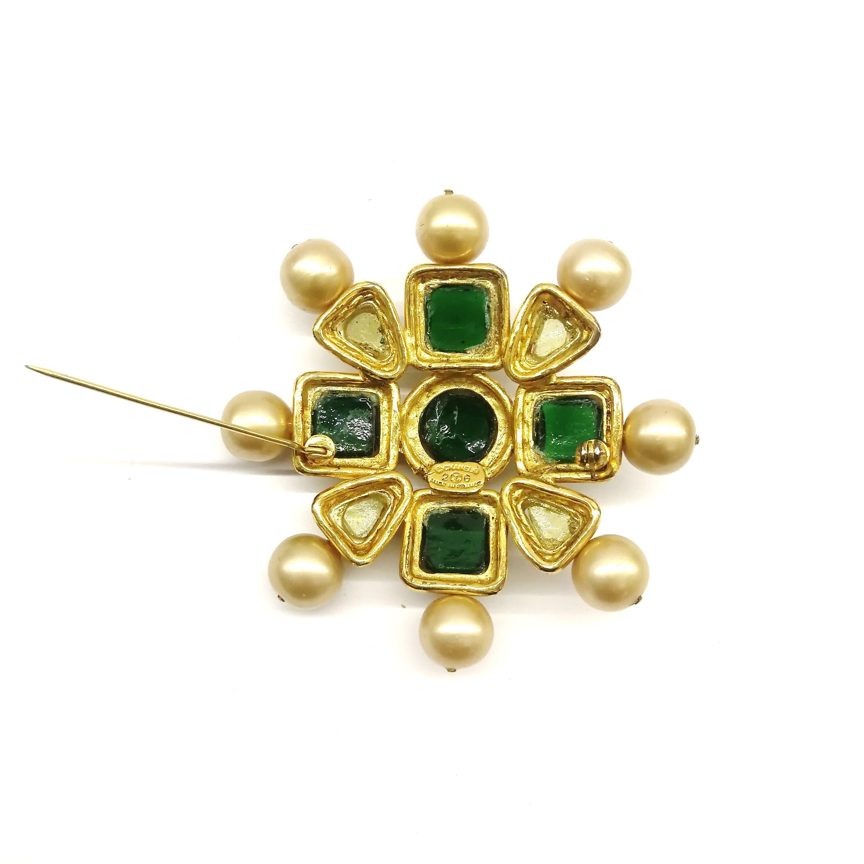 A gilt metal, poured glass 'cruxiform' brooch, Maison Goossens for ...