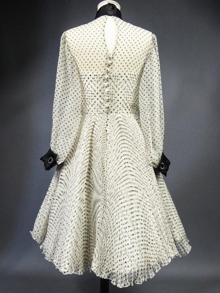 A Jacques Fath Couture Printed Silk Gown Number 00057 with provenance ...