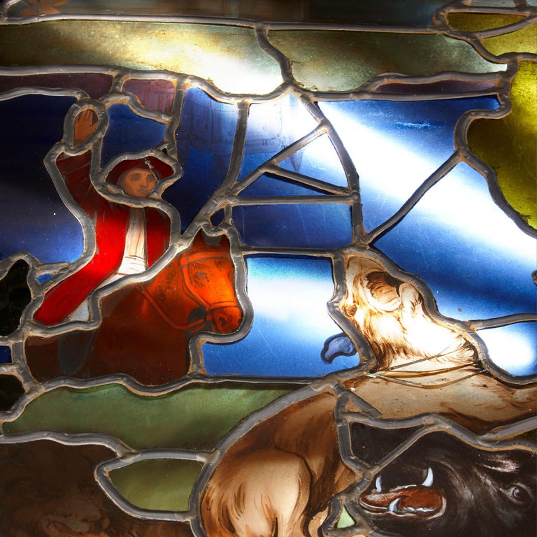 A large amboyna, stained glass, marble, and ormolu mounted centre table ...