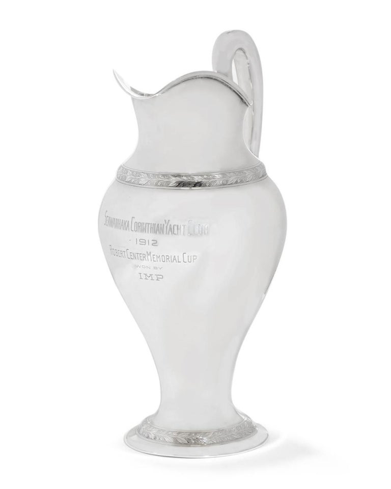 A large American sterling silver pitcher: Seawanhaka Corinthian Yacht ...