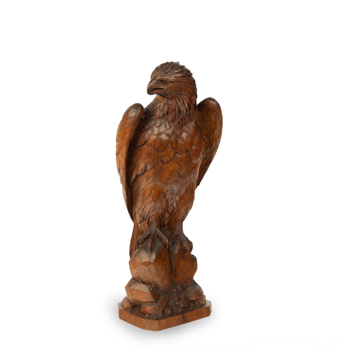 A large Black Forest linden wooden carving of an eagle at 1stDibs