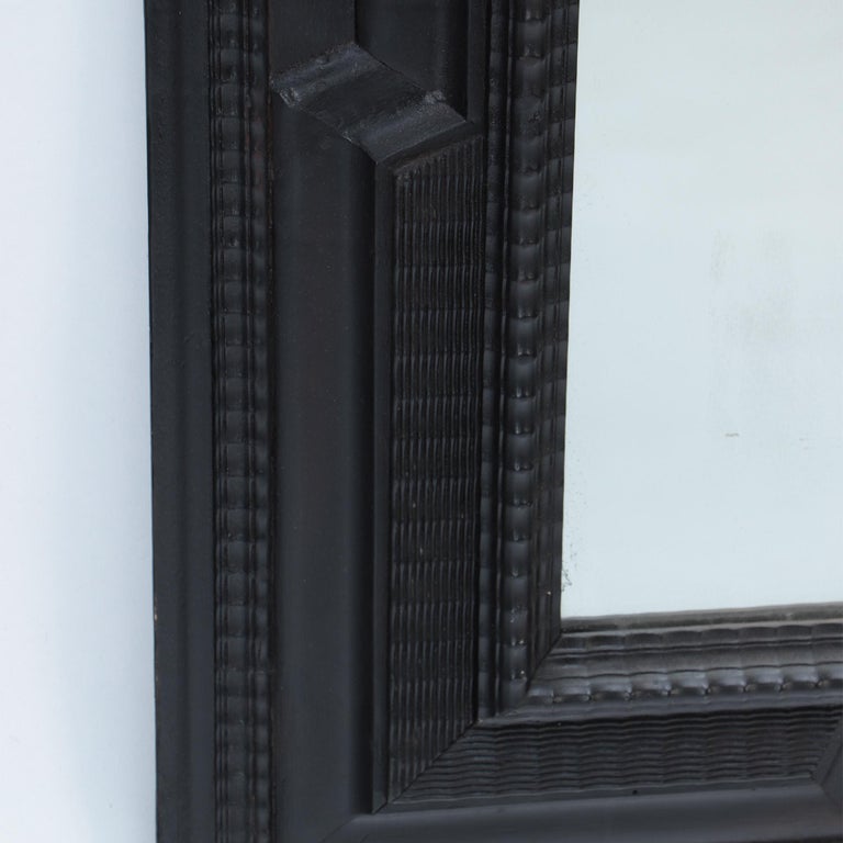 A Large Dutch style ebonIzed frame with ripple carving. Circa 1940. For Sale at 1stDibs