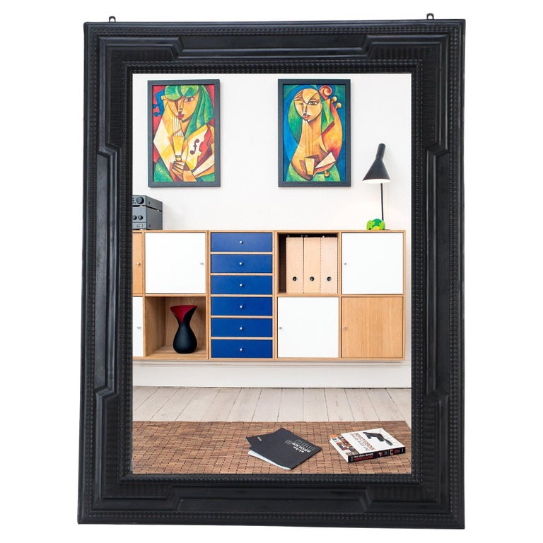 A Large Dutch style ebonIzed frame with ripple carving. Circa 1940. For ...
