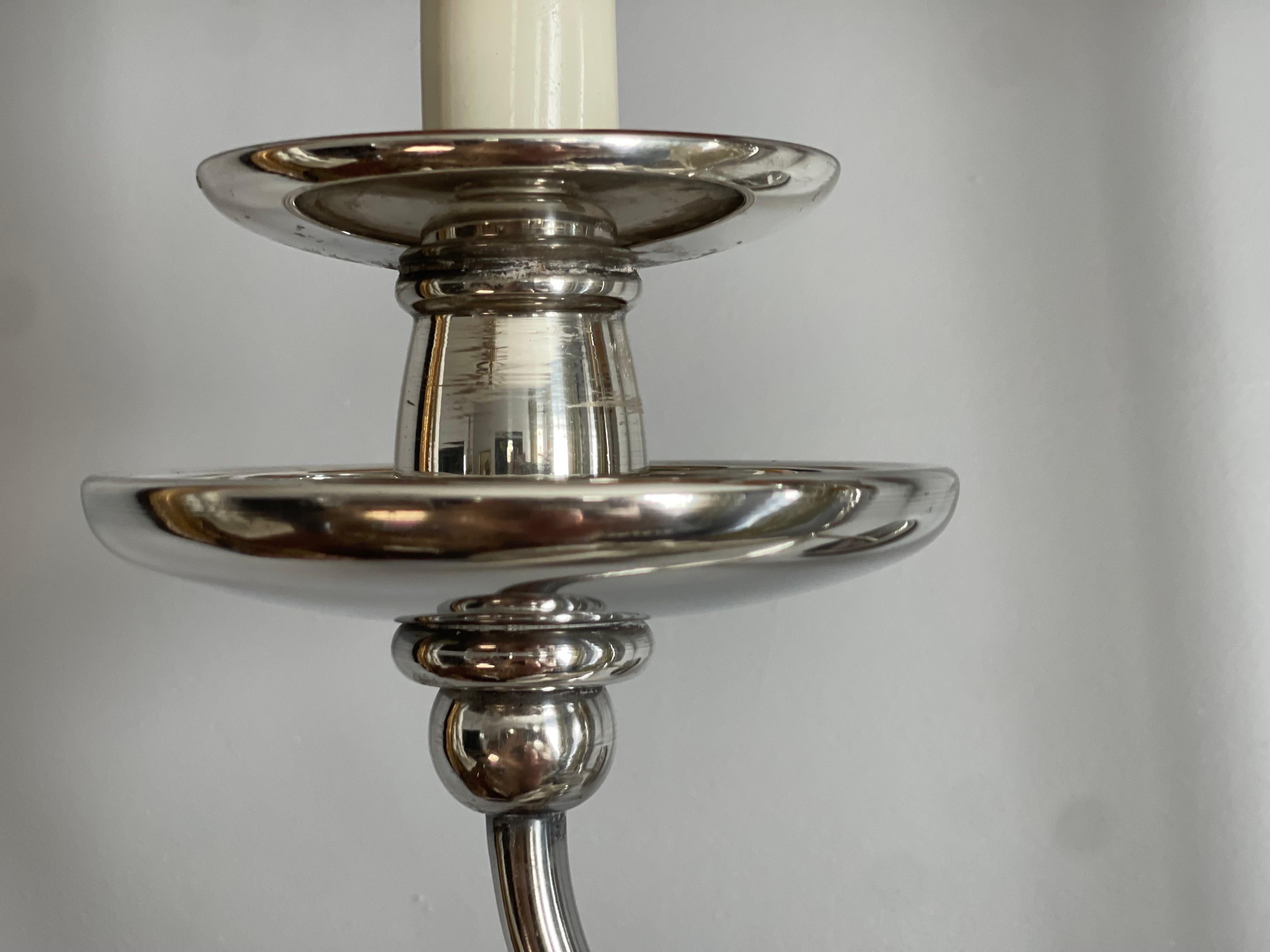 A large Pair of Deco Silver Wall Sconces For Sale at 1stDibs