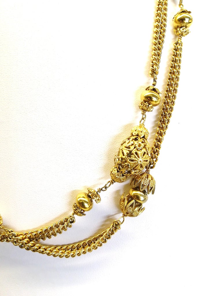 A long gilt metal/filigree sautoir/chain, Robert Goossens for Chanel ...