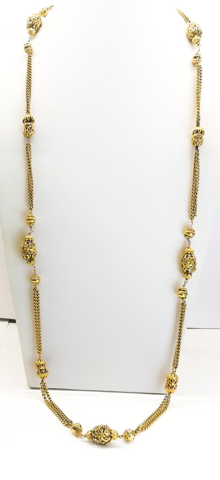 A long gilt metal/filigree sautoir/chain, Robert Goossens for Chanel ...