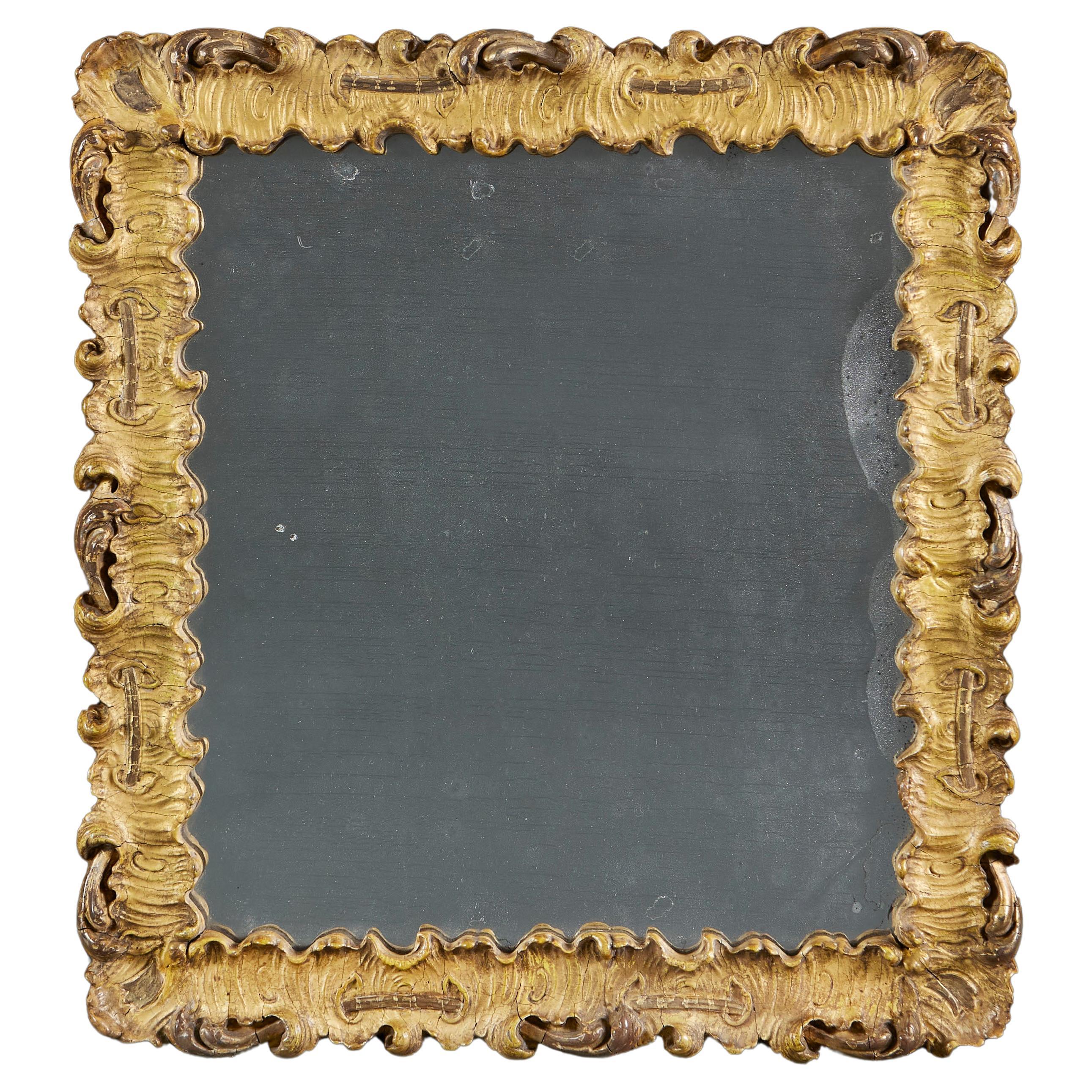 A mid 18th century rocaille giltwood mirror For Sale at 1stDibs