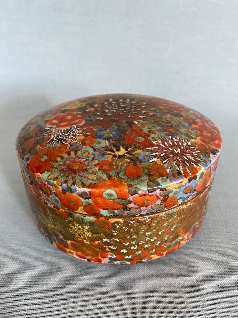 A mid 19th century Japanese Millefleur Satsuma round lid box, with ...