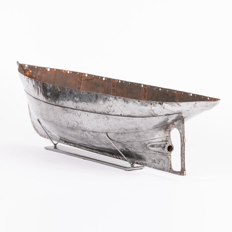 A mid 19th century riveted steel plate hull of a model steam yacht. For ...