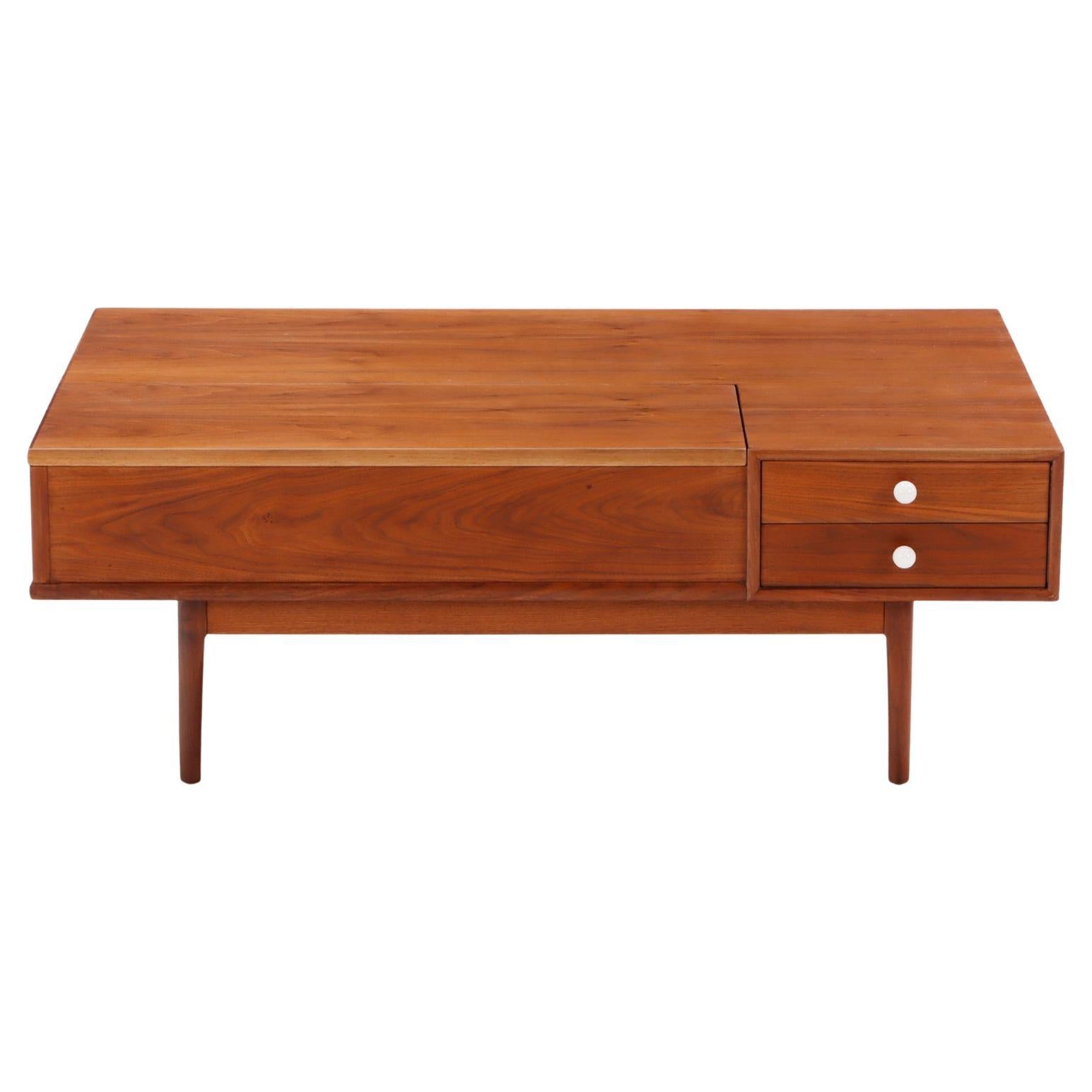 A mid century modern walnut Drexel Declaration coffee table by Kip ...
