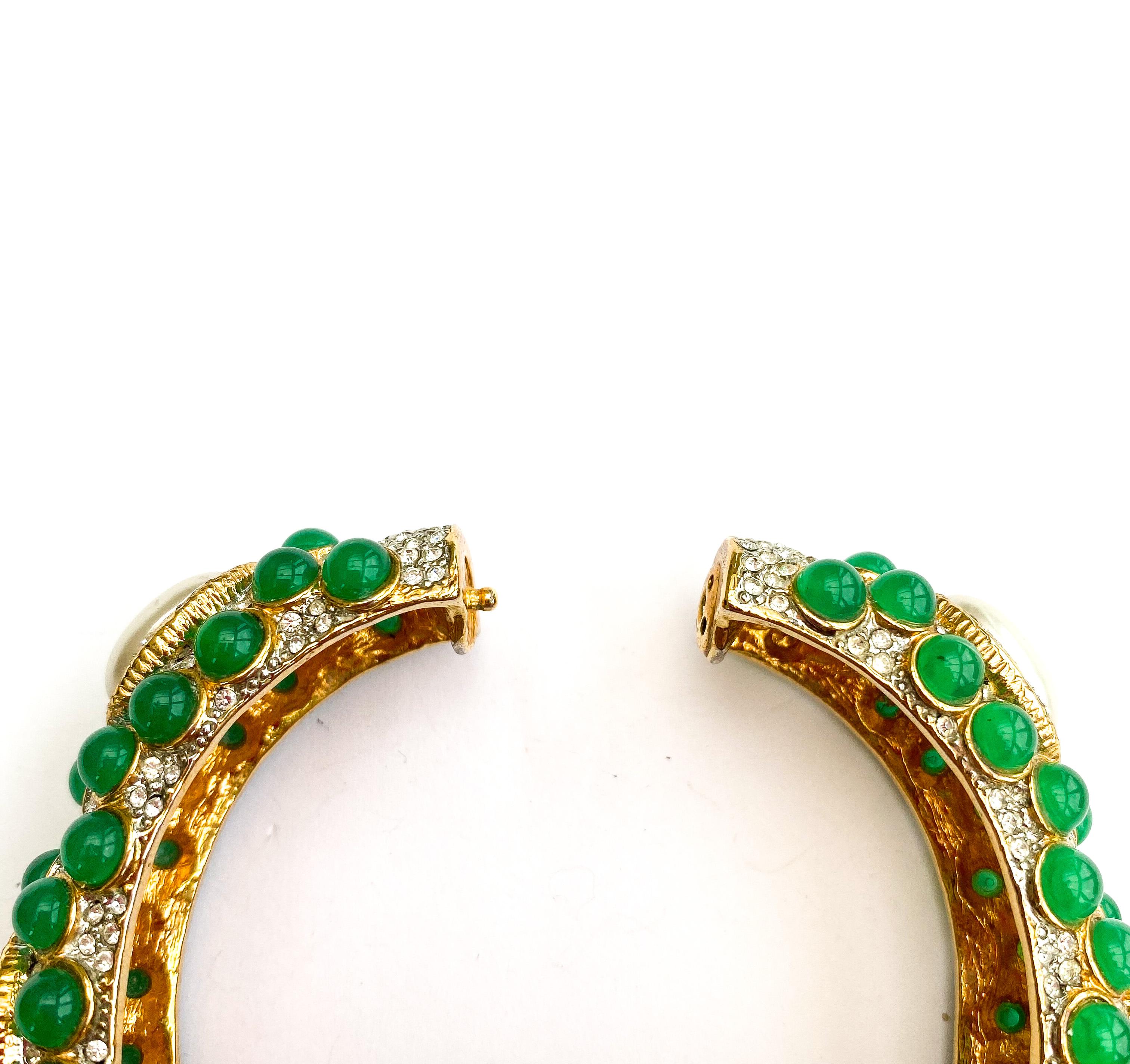 A Moghul-style clear and emerald paste bangle, Kenneth Lane, USA ...